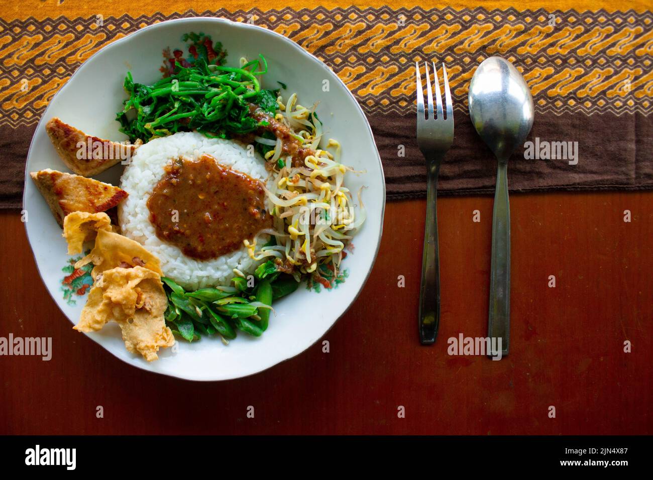 Nasi Pecel or sego pecel is Traditional Javanese rice dish of steamed ...