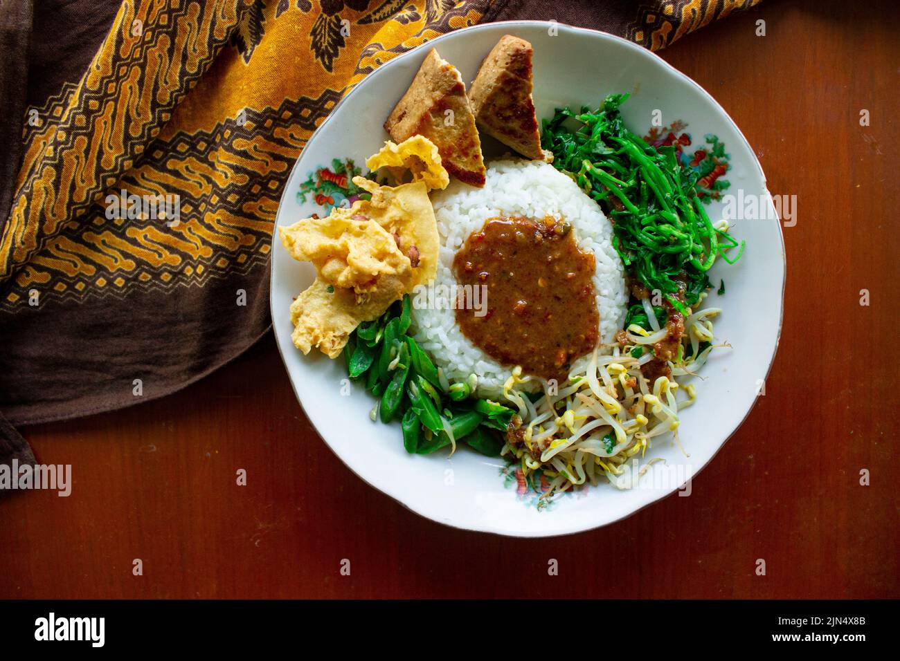 Nasi Pecel or sego pecel is Traditional Javanese rice dish of steamed ...