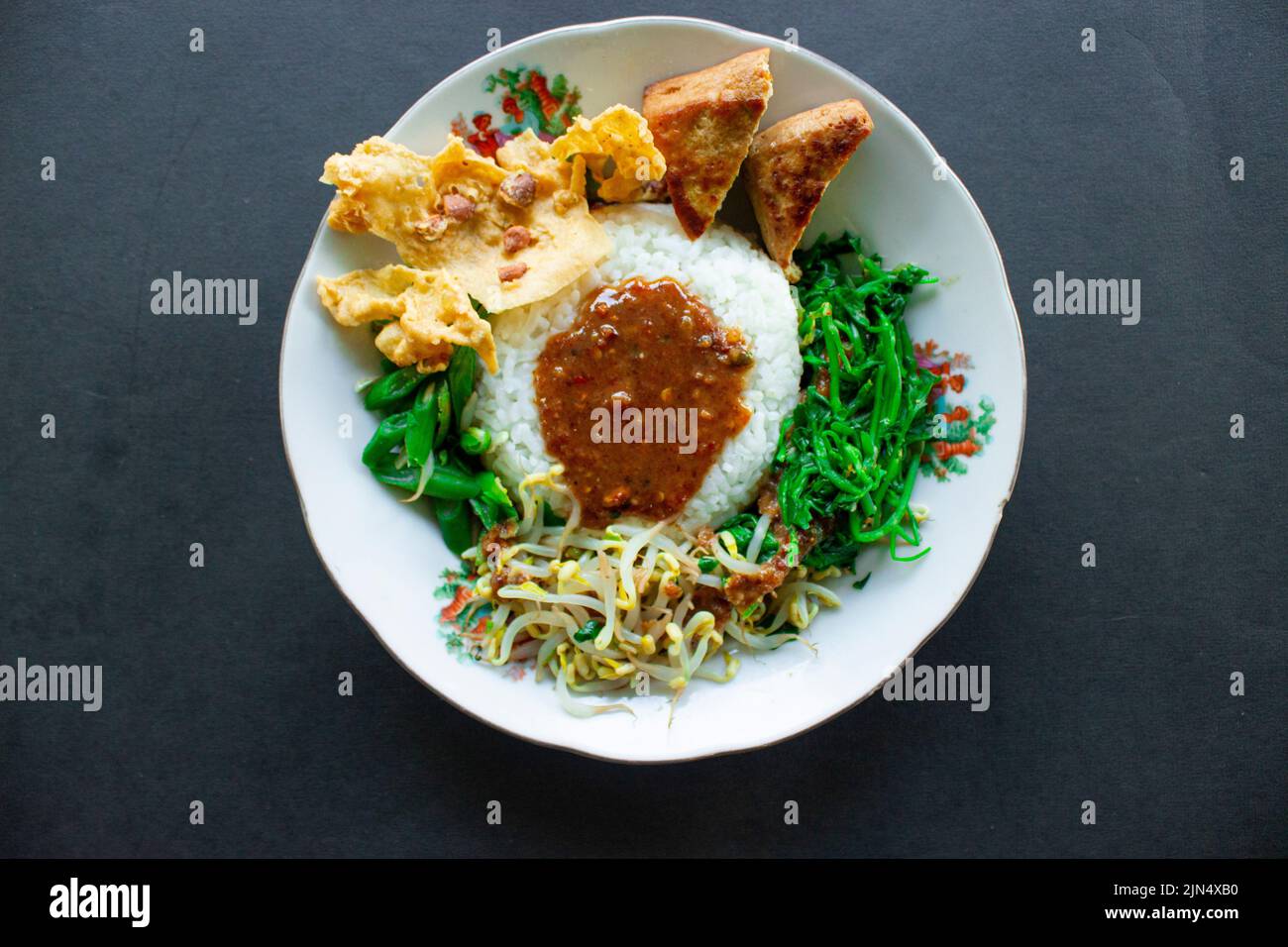 Nasi Pecel or sego pecel is Traditional Javanese rice dish of steamed ...