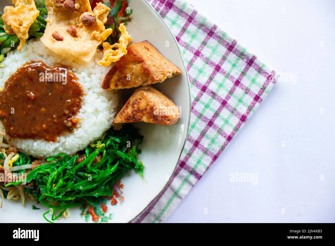 Nasi Pecel or sego pecel is Traditional Javanese rice dish of steamed ...