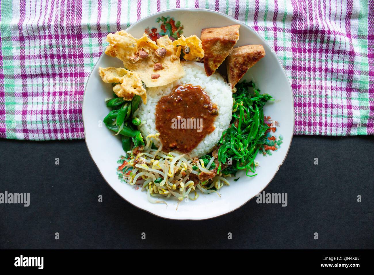 Nasi Pecel or sego pecel is Traditional Javanese rice dish of steamed ...