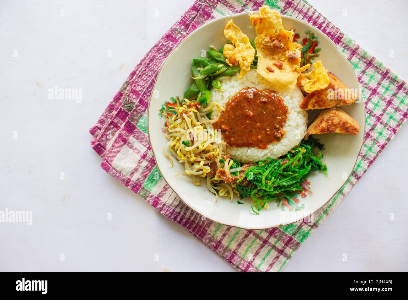 Nasi Pecel or sego pecel is Traditional Javanese rice dish of steamed ...
