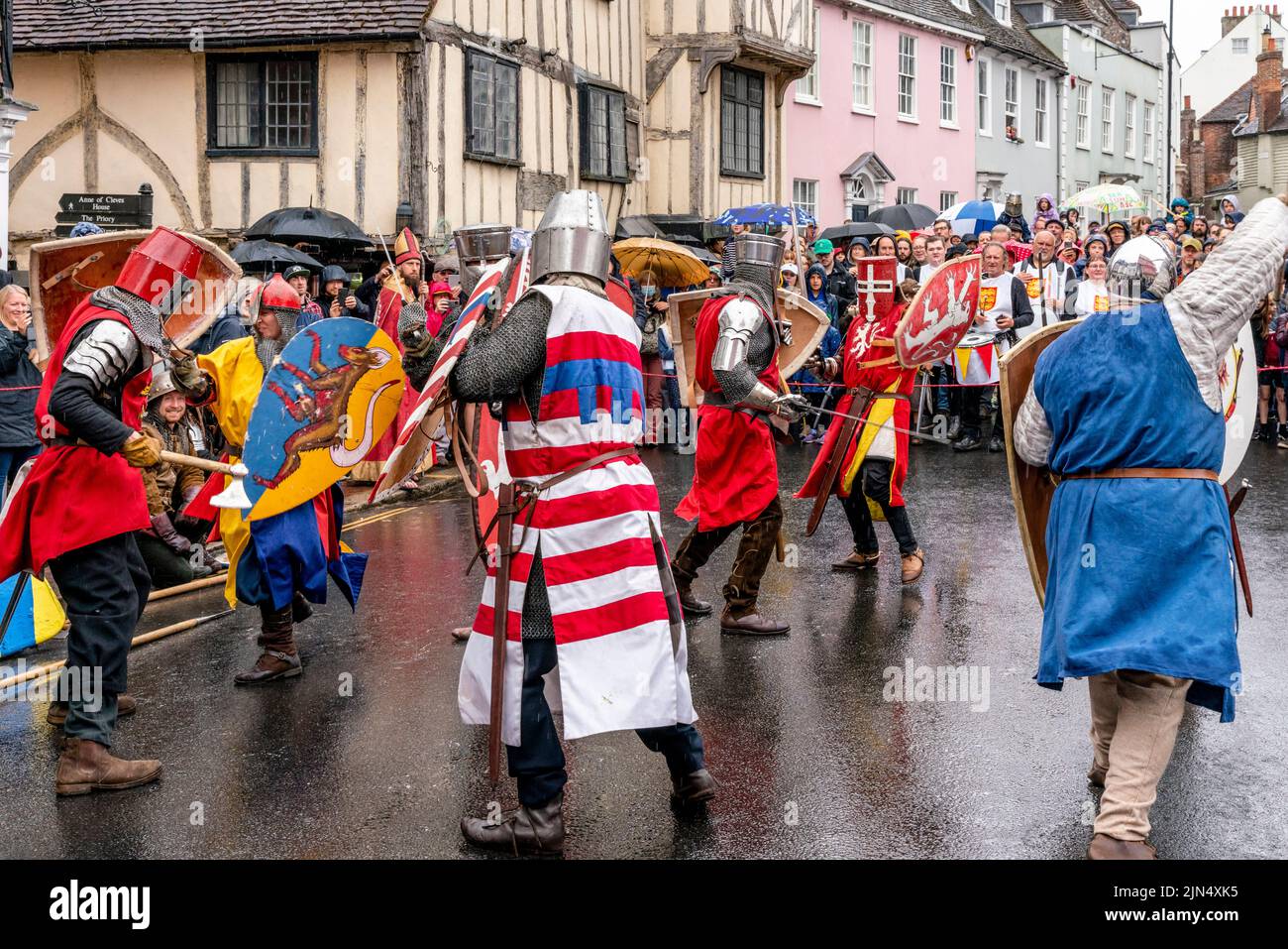 People Dressed In Medieval Costume Take Part In A Re-Enactment Of The ...