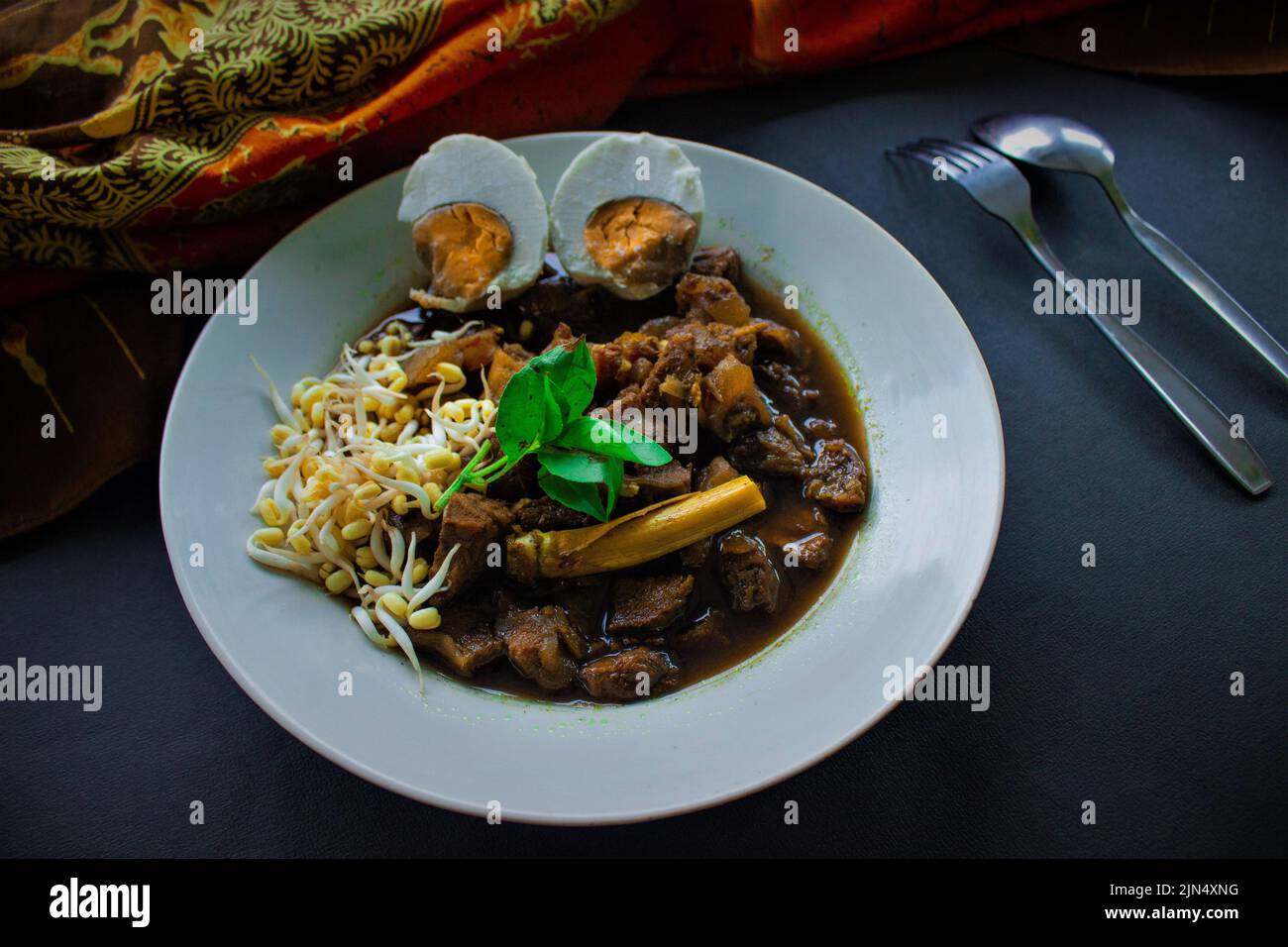 Rawon or Nasi Rawon/Rawon Rice is traditional Indonesian beef black ...