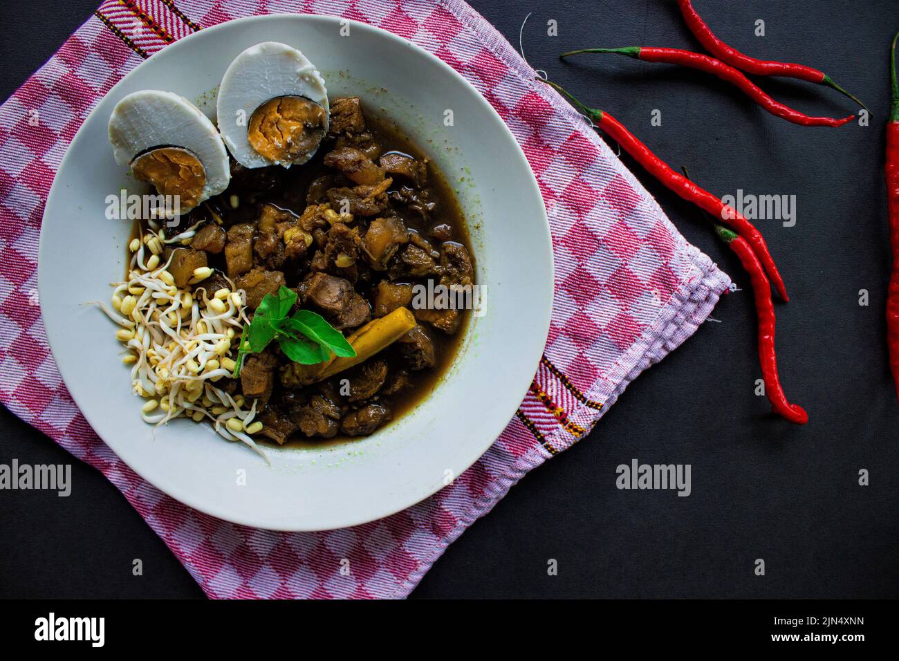 Rawon or Nasi Rawon/Rawon Rice is traditional Indonesian beef black ...