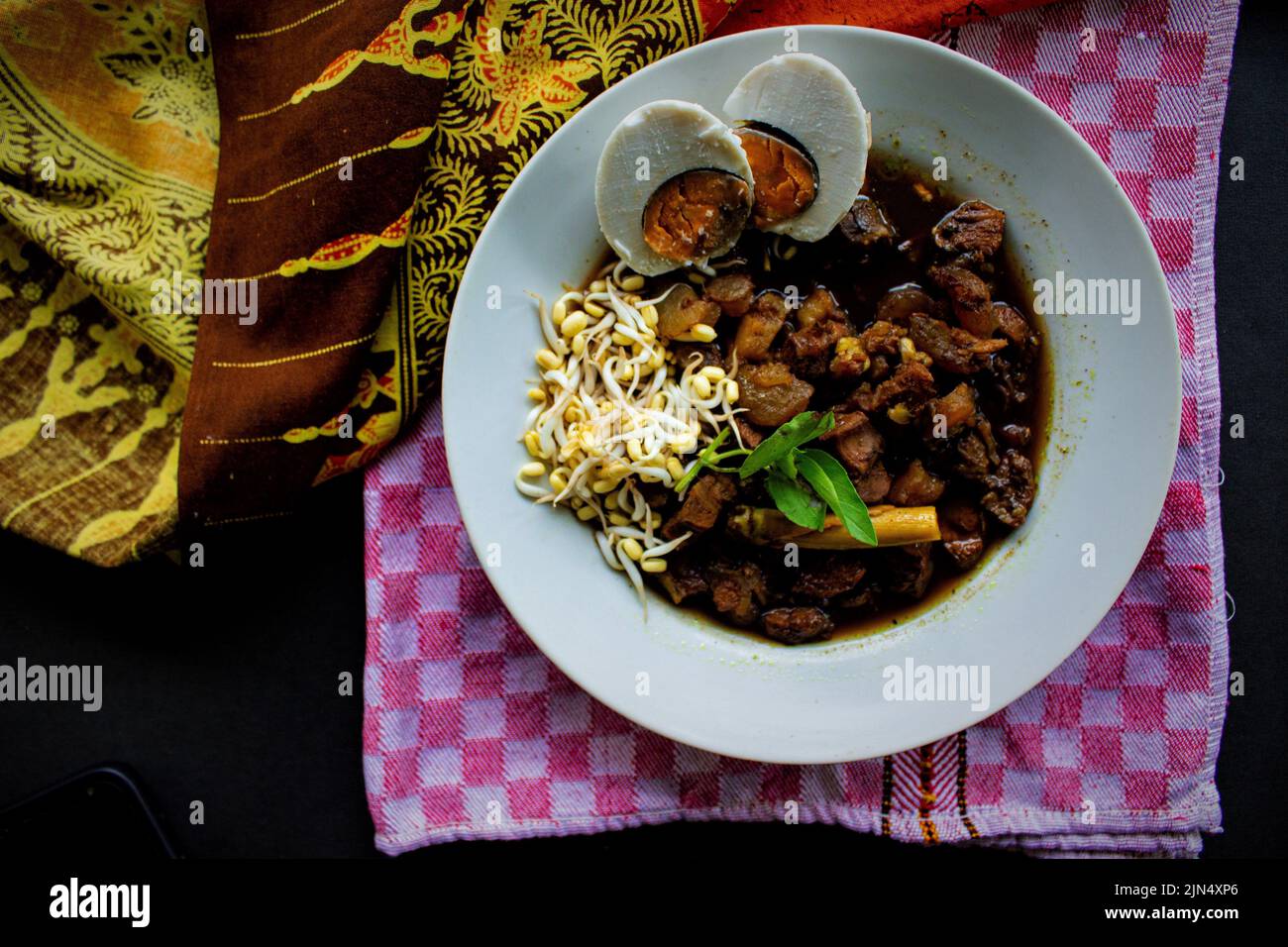 Rawon or Nasi Rawon/Rawon Rice is traditional Indonesian beef black ...