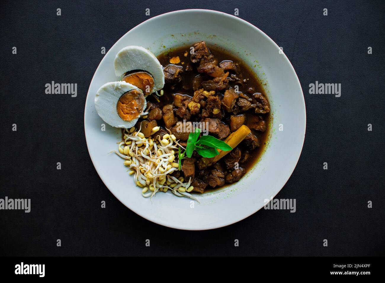 Rawon or Nasi Rawon/Rawon Rice is traditional Indonesian beef black ...