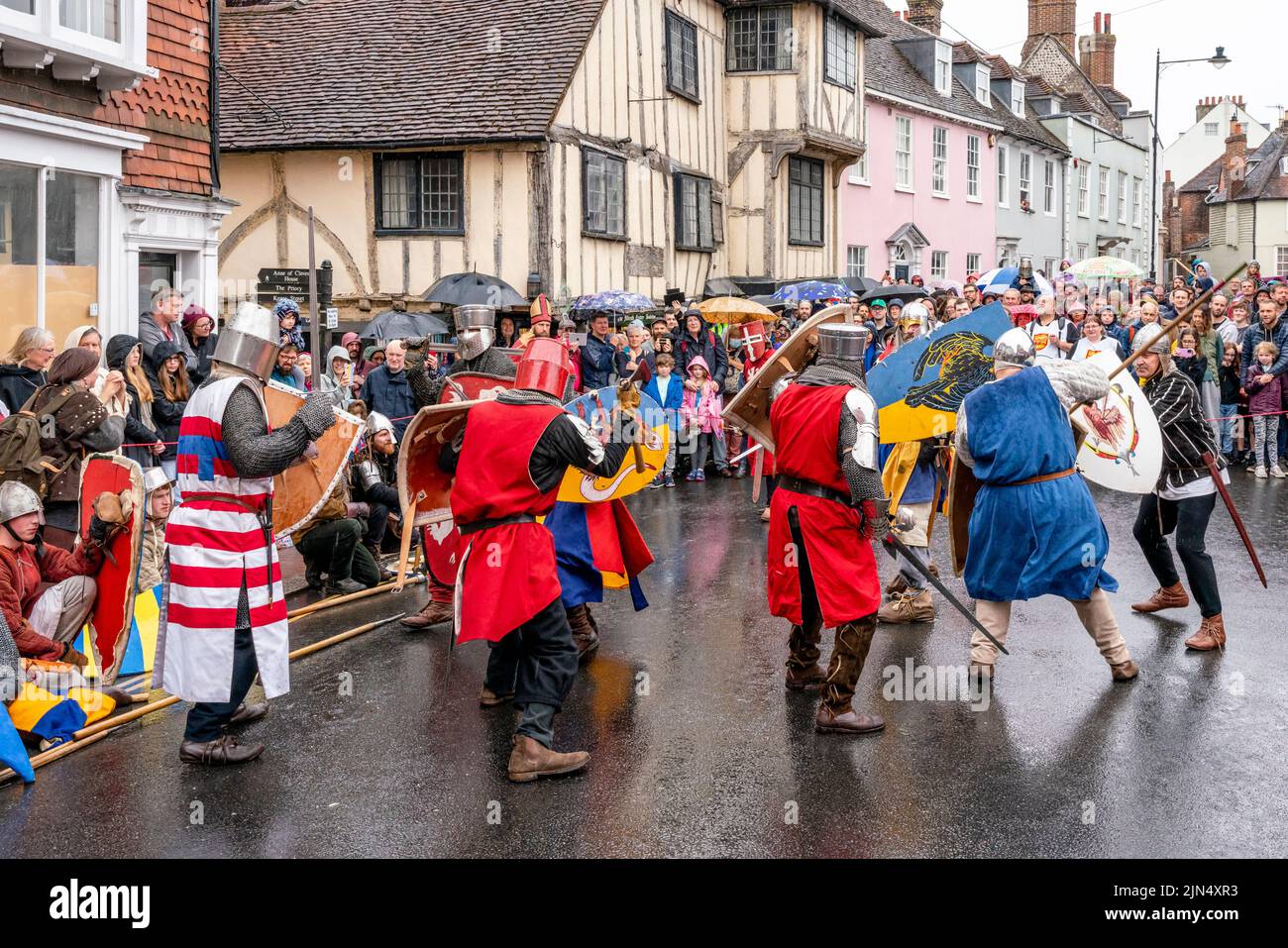 People Dressed In Medieval Costume Take Part In A Re-Enactment Of The ...