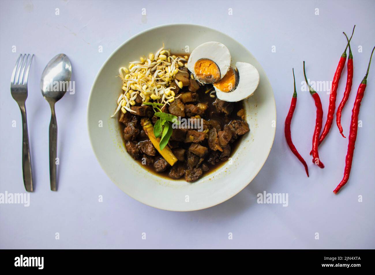 Rawon or Nasi Rawon/Rawon Rice is traditional Indonesian beef black ...