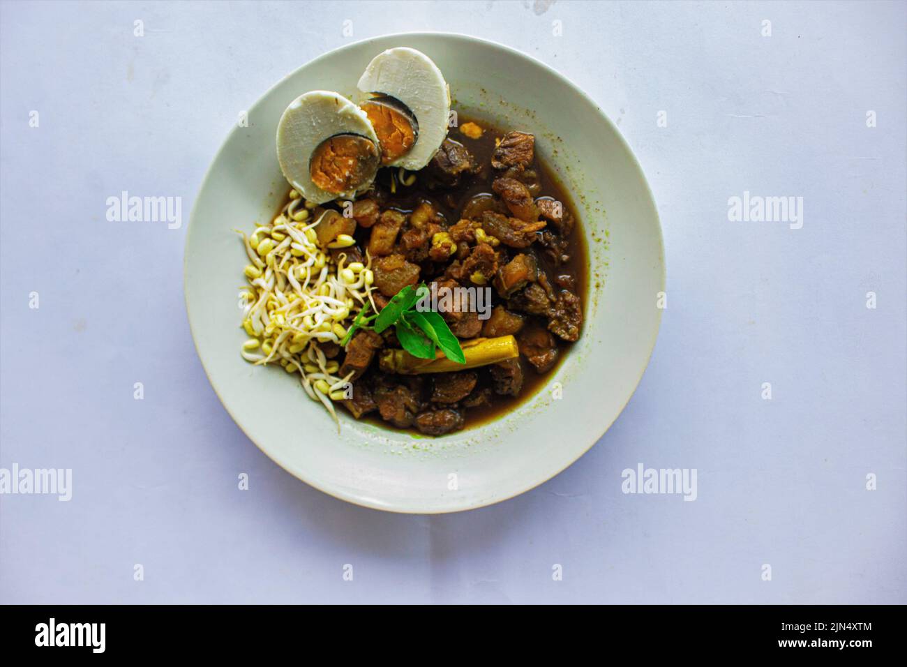 Rawon or Nasi Rawon/Rawon Rice is traditional Indonesian beef black ...