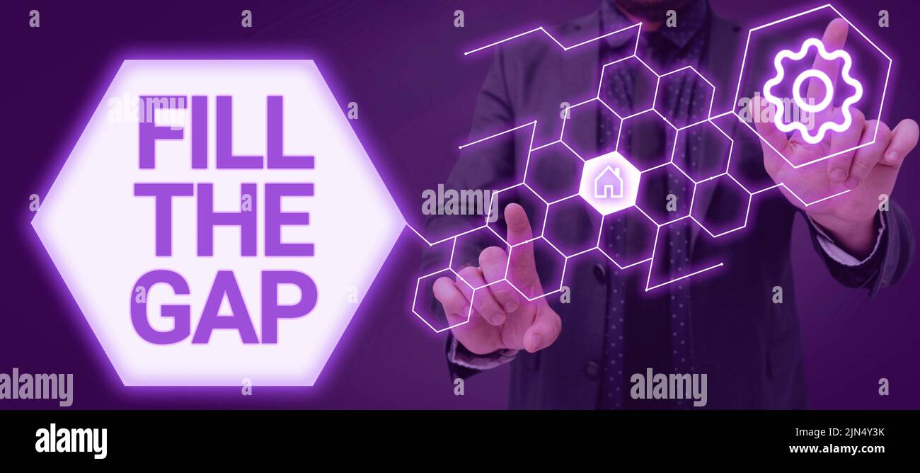 Hand writing sign Fill The Gap. Word Written on Put he missing part in ...