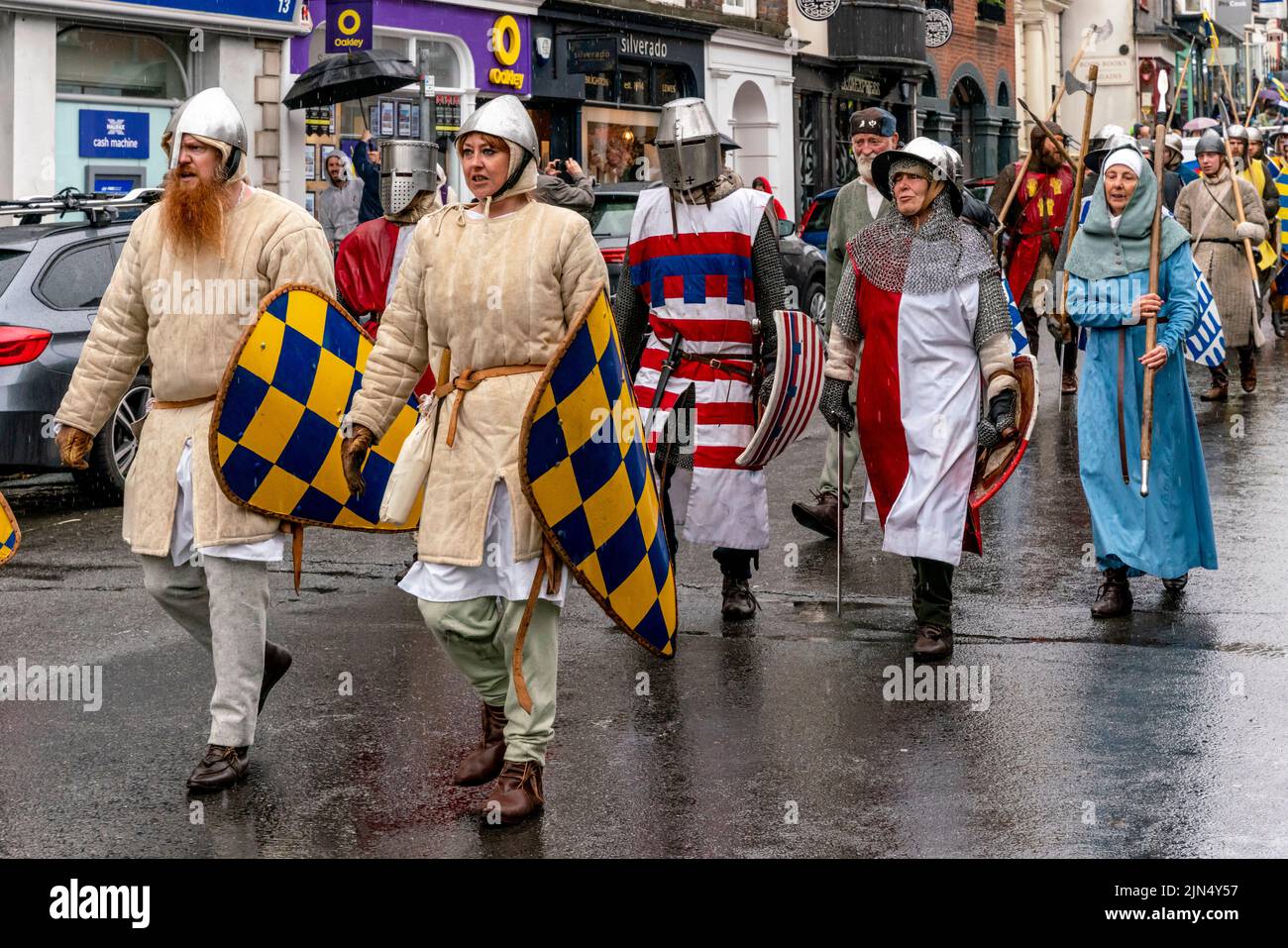 People Dressed In Medieval Costume Take Part In A Procession Through ...