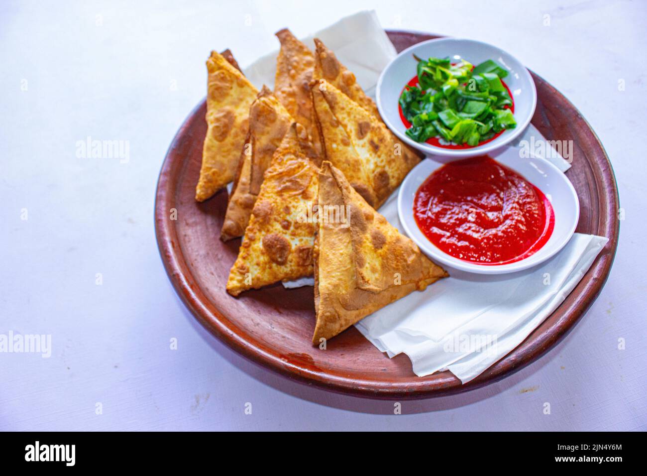 Samosa, samsa or somsa are triangular fried pastries or pastri served ...