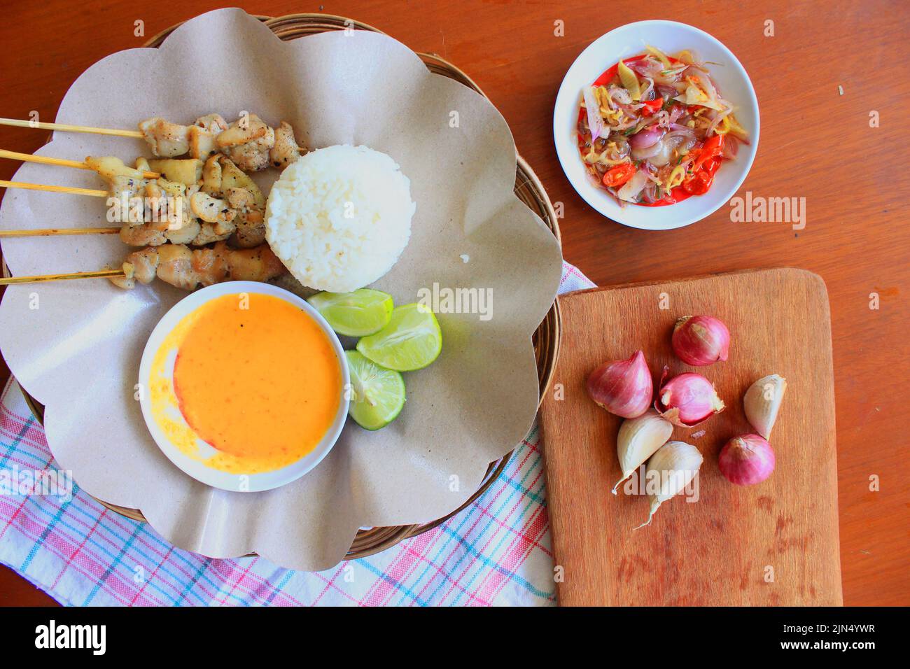 sate taichan or taichan satay , made from chicken meat, served with ...