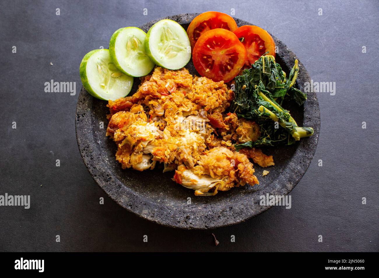 ayam geprek or chicken crush or chicken smashed is indonesian food made ...