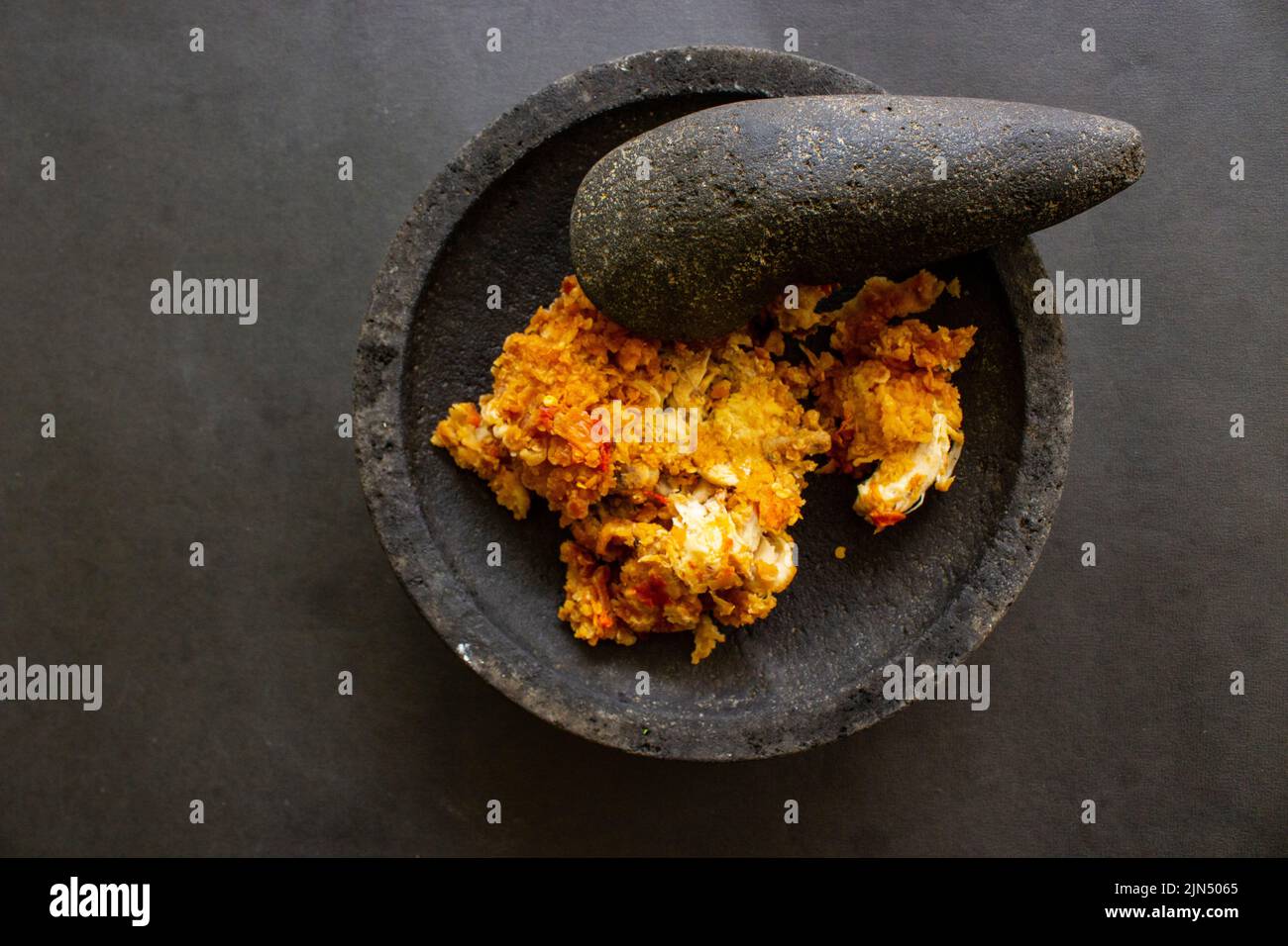 ayam geprek or chicken crush or chicken smashed is indonesian food made ...