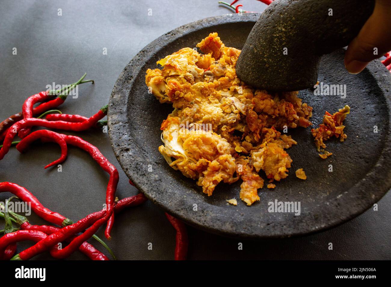 ayam geprek or chicken crush or chicken smashed is indonesian food made ...