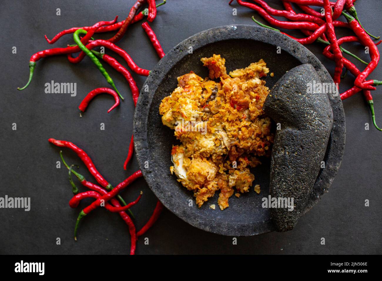 ayam geprek or chicken crush or chicken smashed is indonesian food made ...