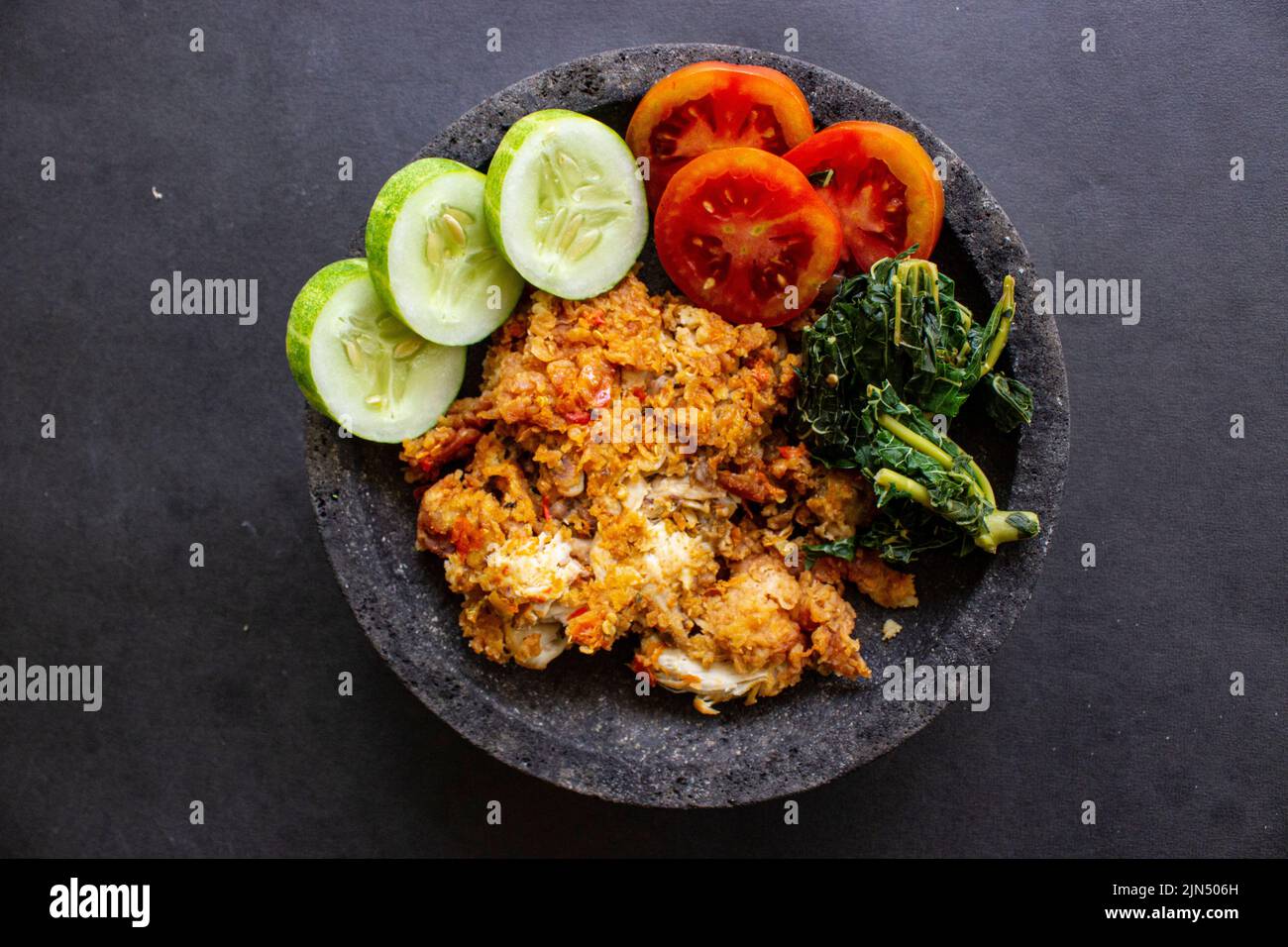 ayam geprek or chicken crush or chicken smashed is indonesian food made ...