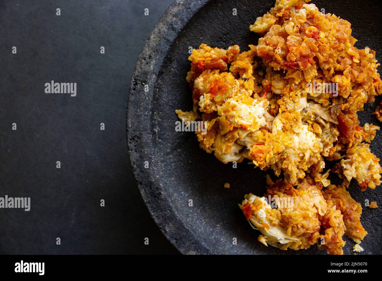 ayam geprek or chicken crush or chicken smashed is indonesian food made ...