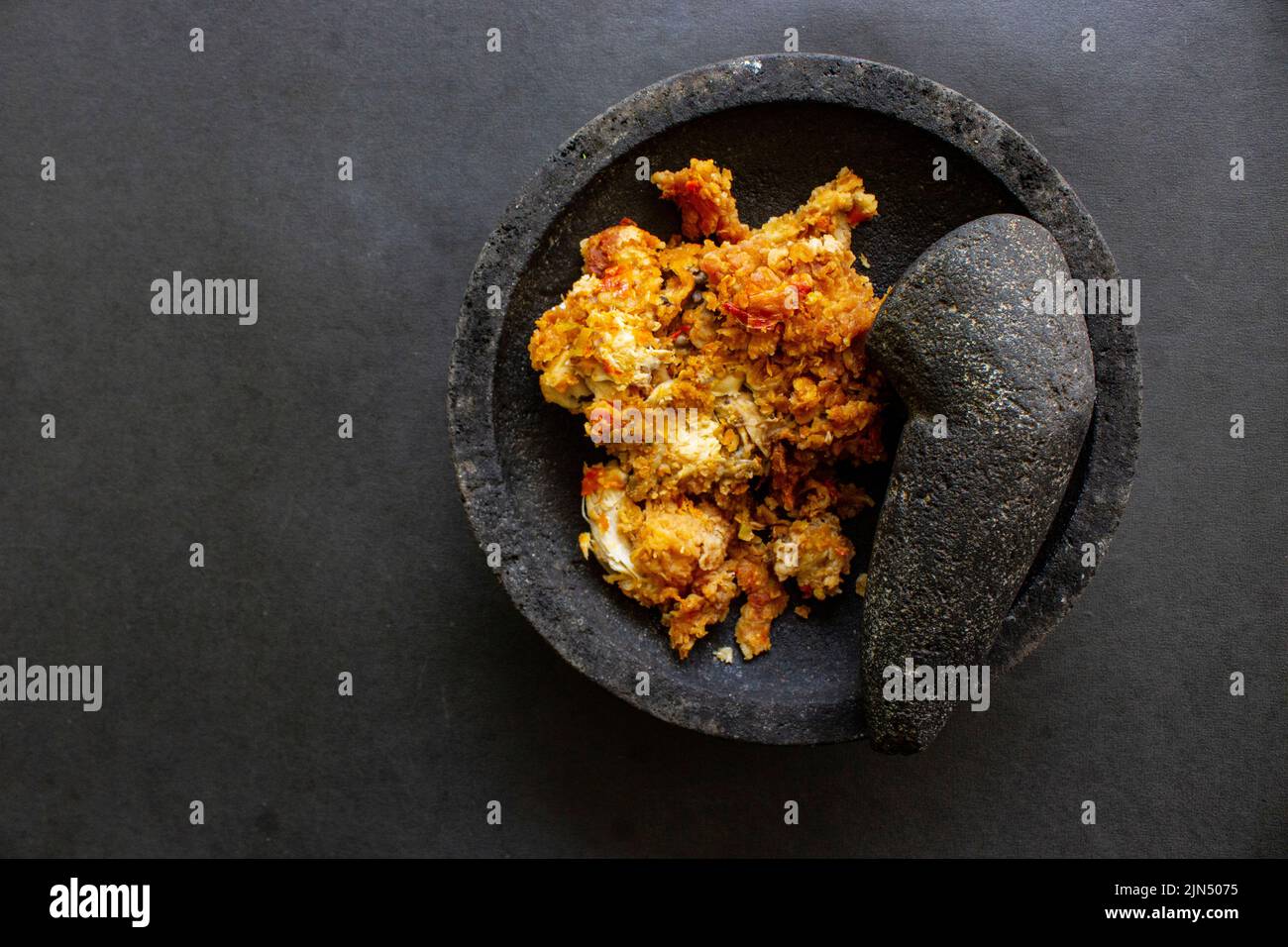 ayam geprek or chicken crush or chicken smashed is indonesian food made ...