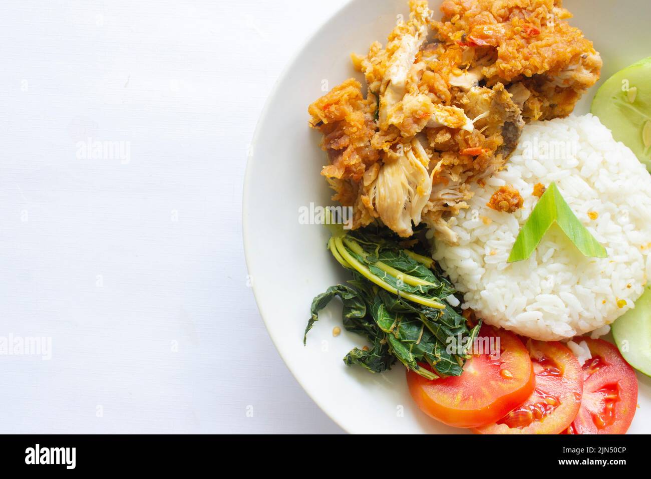 ayam geprek or chicken crush or chicken smashed is indonesian food made ...