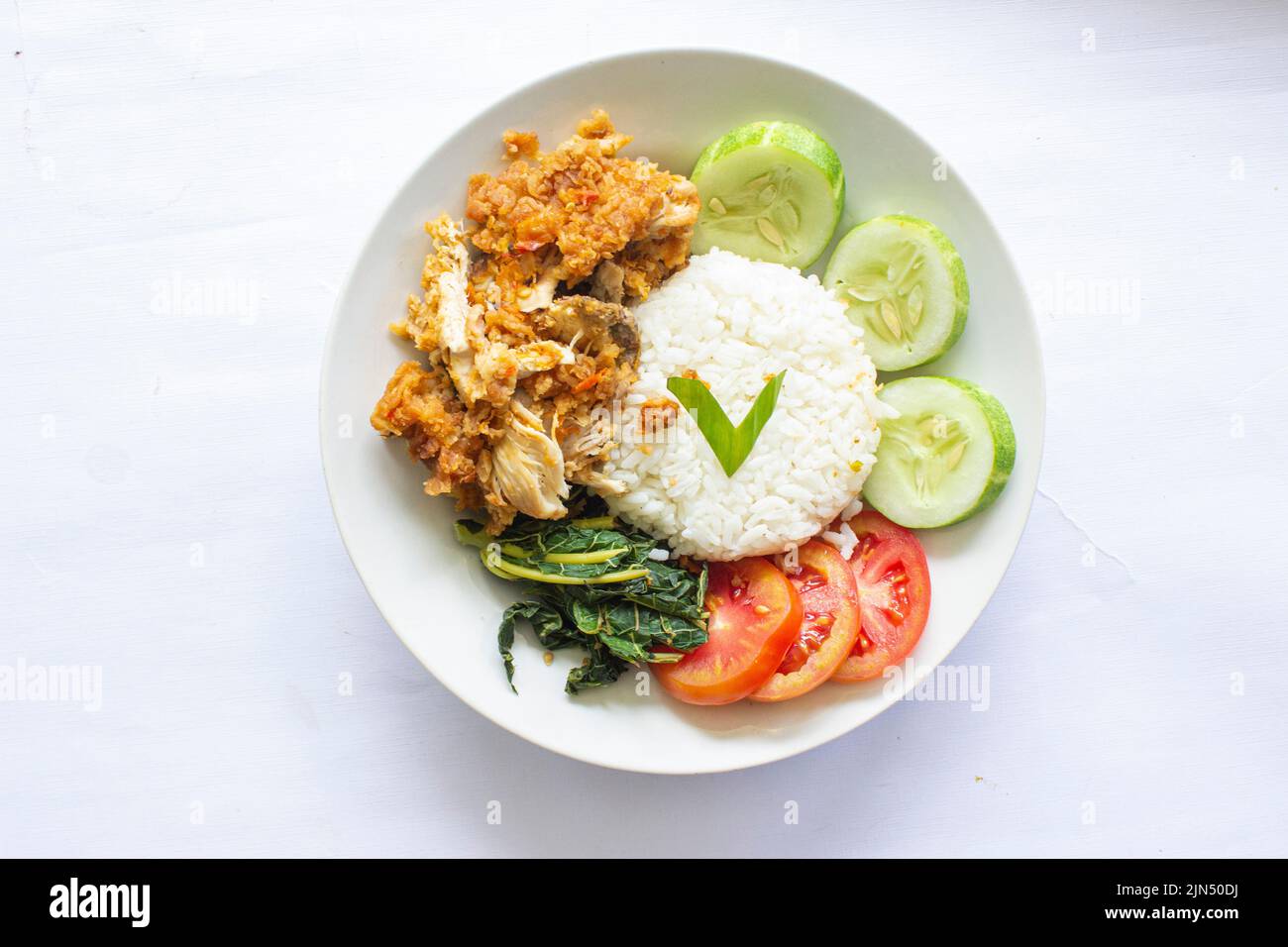 ayam geprek or chicken crush or chicken smashed is indonesian food made ...
