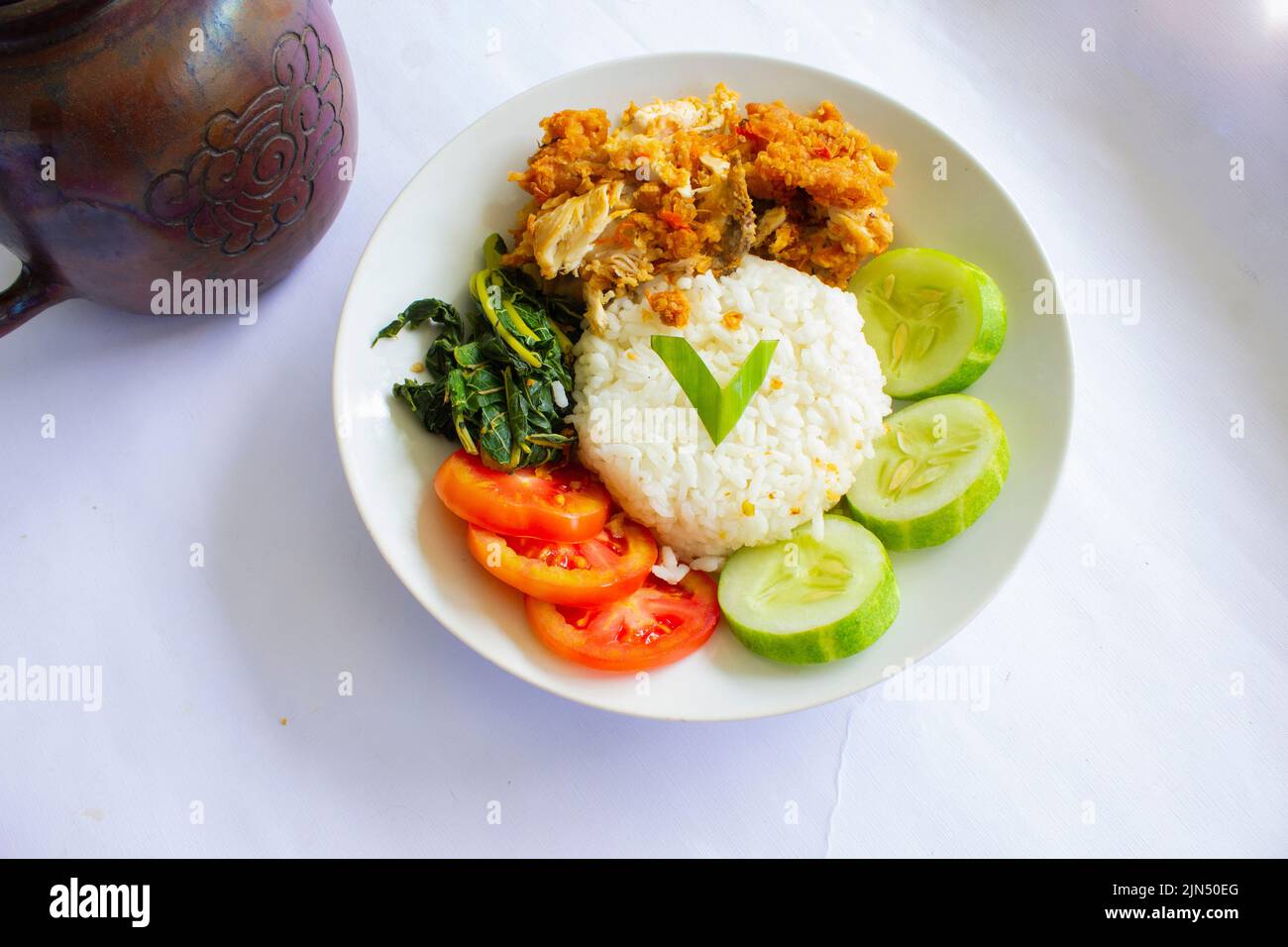 ayam geprek or chicken crush or chicken smashed is indonesian food made ...