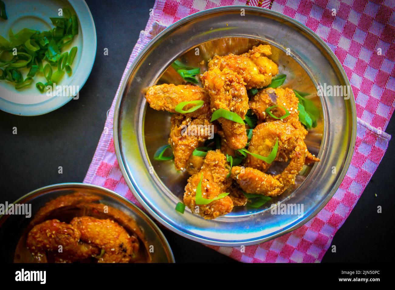Delicious homemade crispy fried chicken with spicy taste and lemon on ...