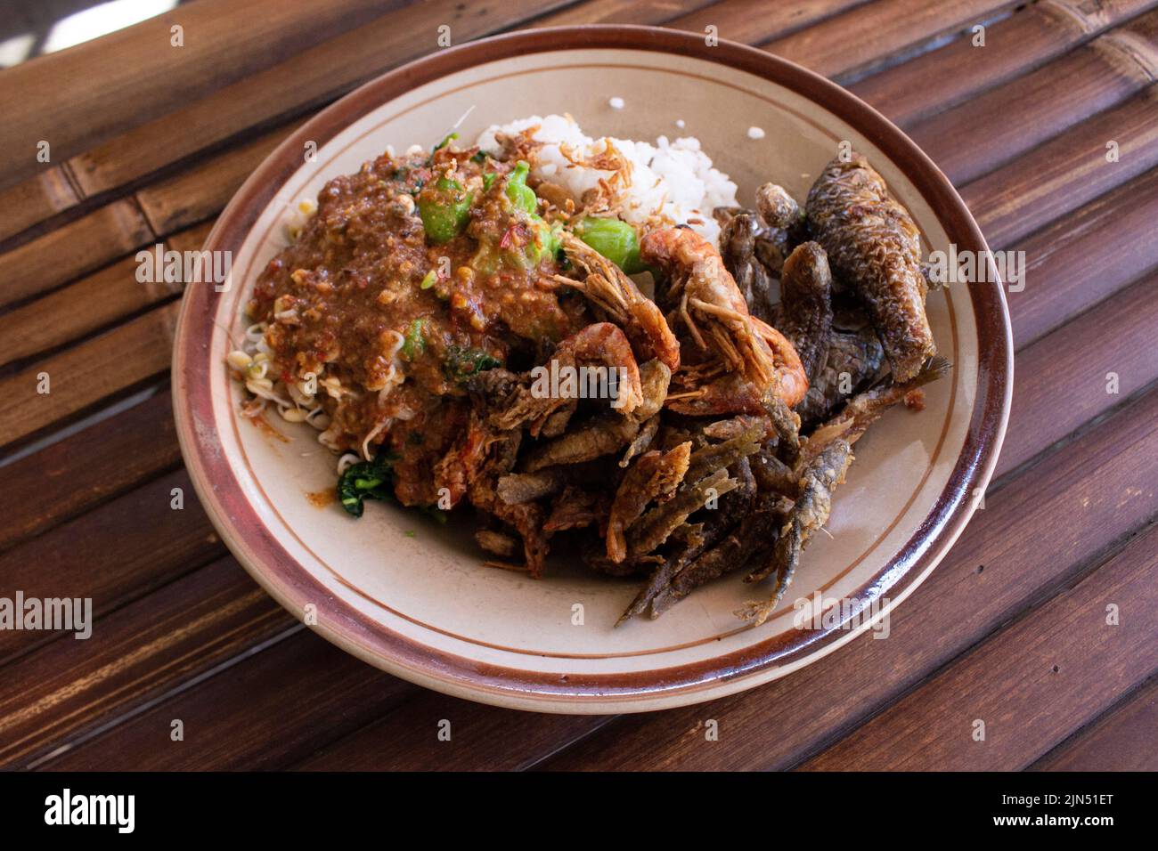 Nasi Pecel or sego pecel is Traditional Javanese rice dish of steamed ...