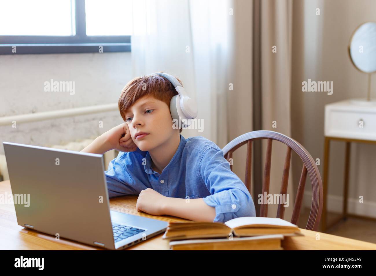 Online education concept - photo of a teemager boy during an online ...