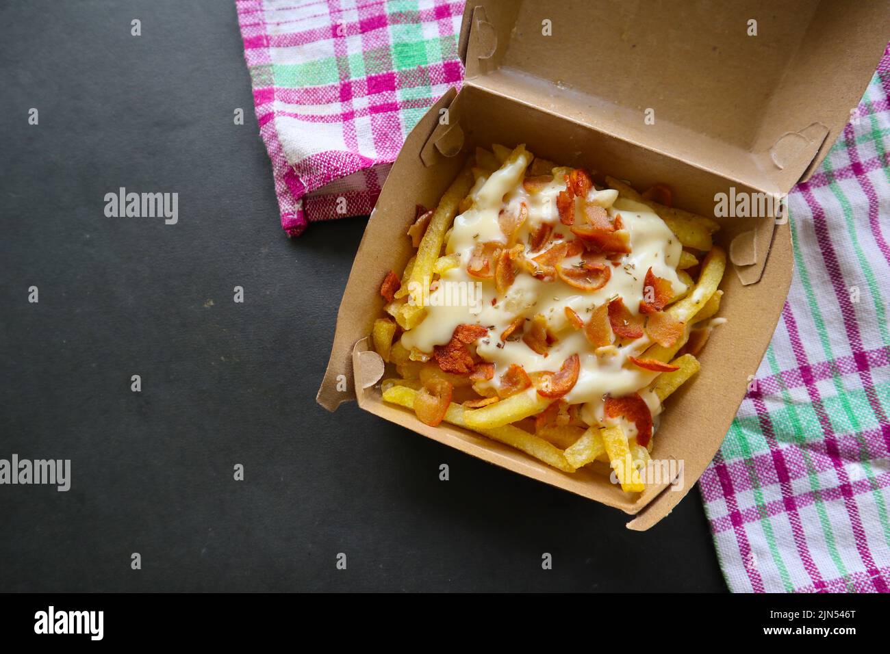 fried fries with with melted cheddar cheese or fried cheese with ...