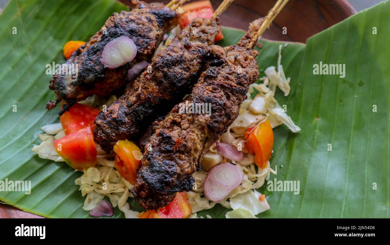 sate buntel or satay buntel is satay made from minced mutton wrapped in ...