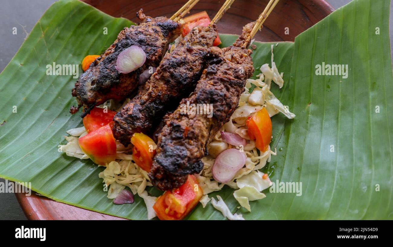 sate buntel or satay buntel is satay made from minced mutton wrapped in ...