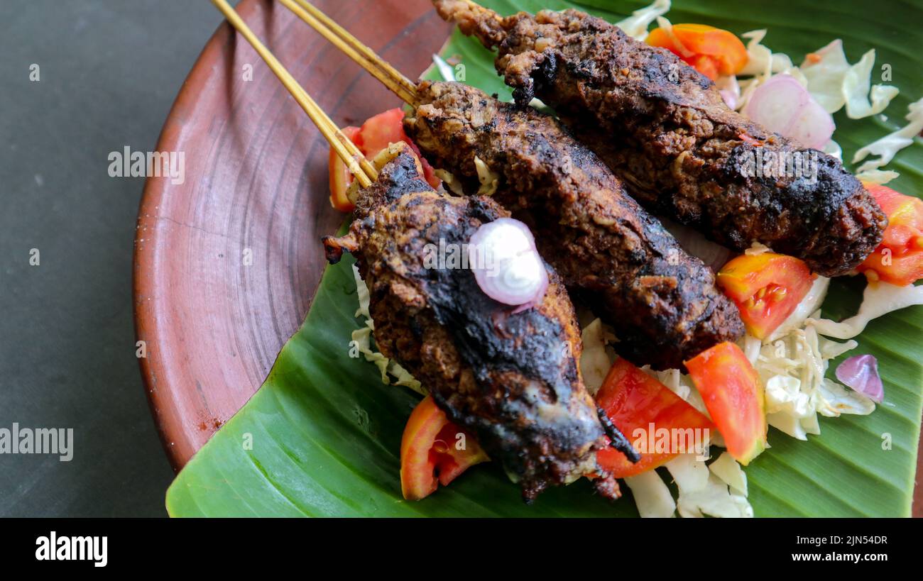 sate buntel or satay buntel is satay made from minced mutton wrapped in ...