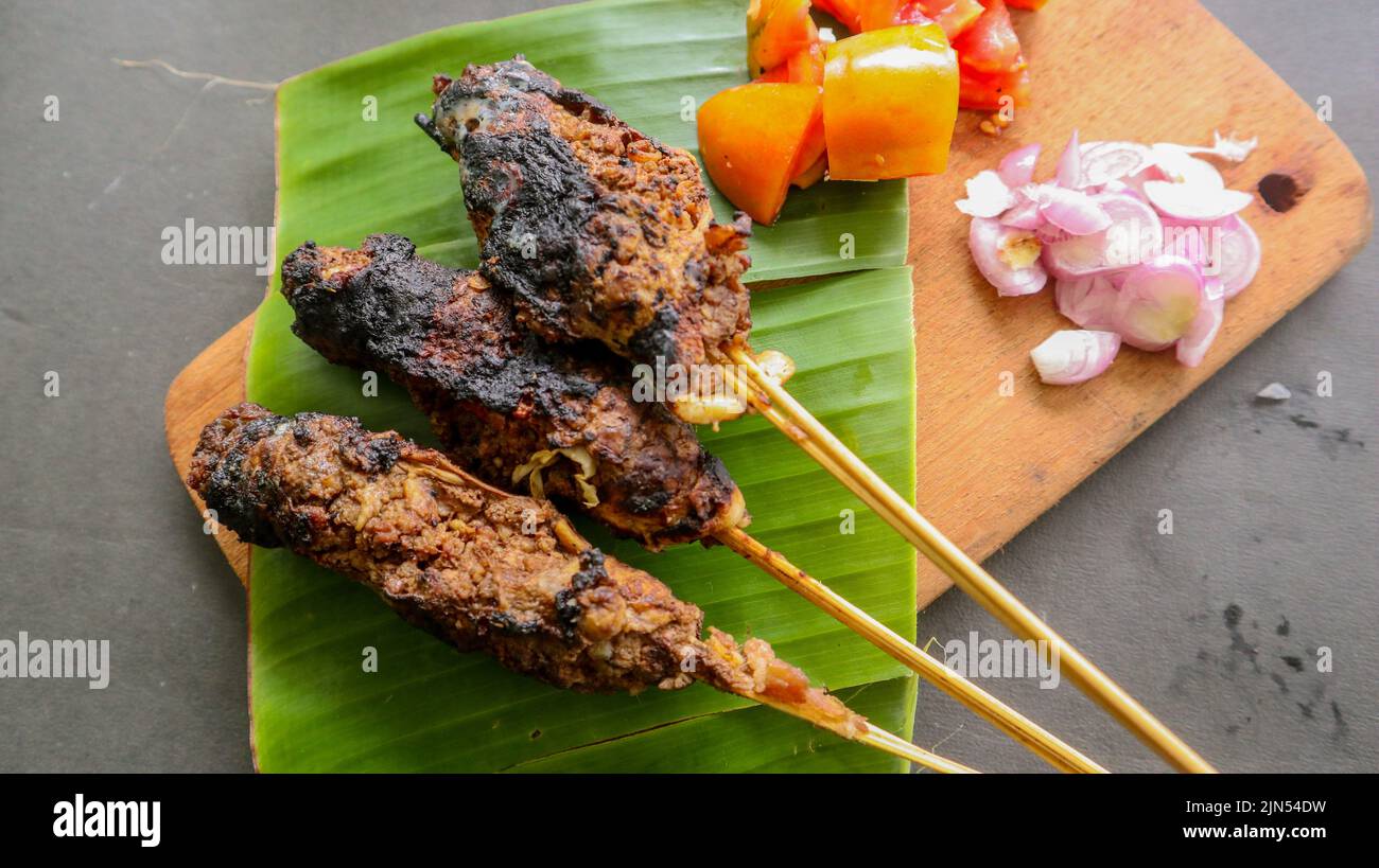 sate buntel or satay buntel is satay made from minced mutton wrapped in ...
