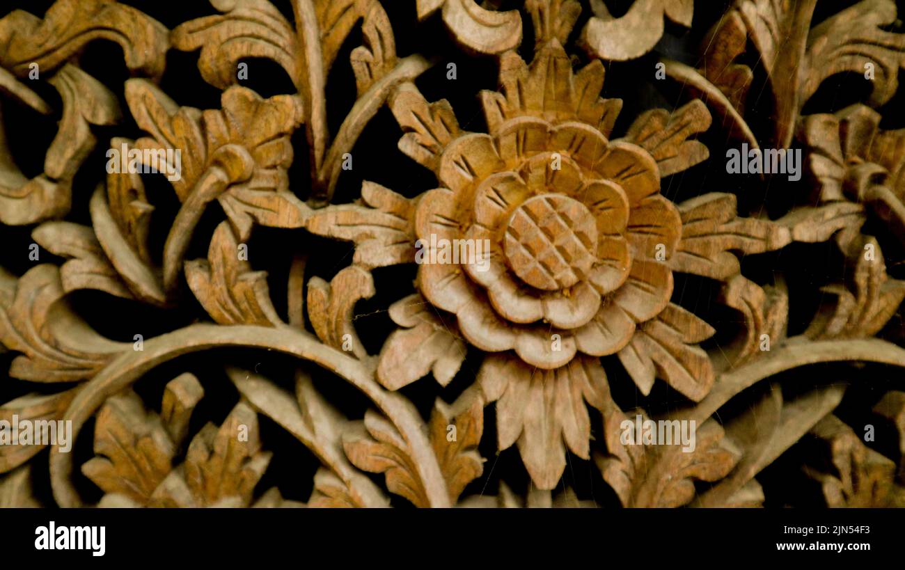 wood carving, floral pattern carved on wooden background. gebyok Stock ...