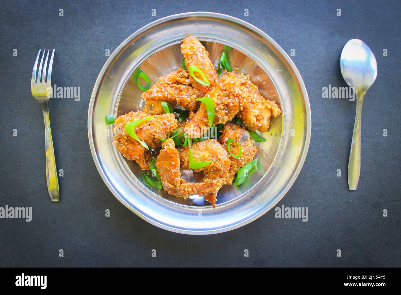 Delicious homemade crispy fried chicken with spicy taste and lemon on ...