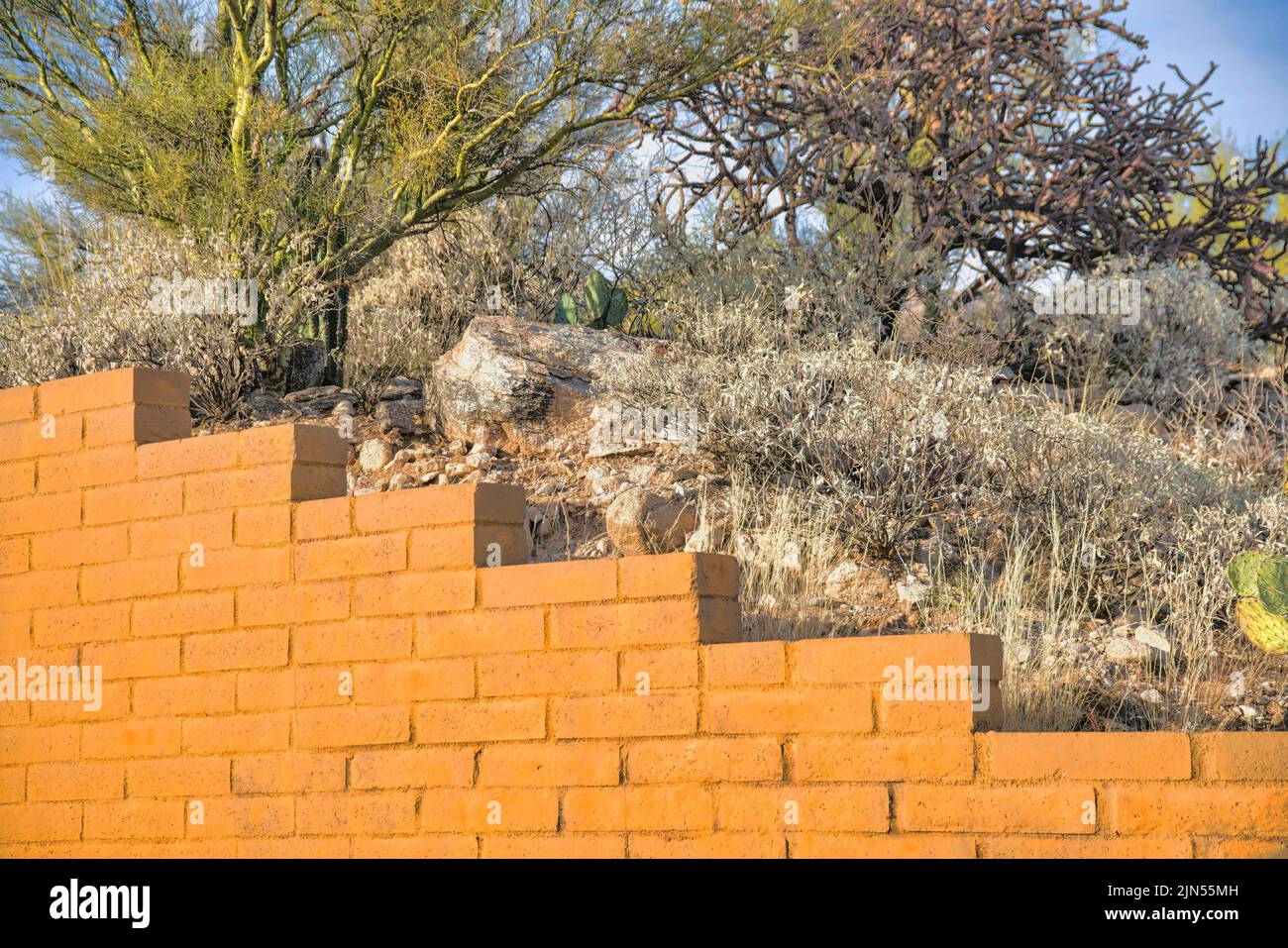 Concrete block wall with layered structure at Tucson, Arizona. Painted ...