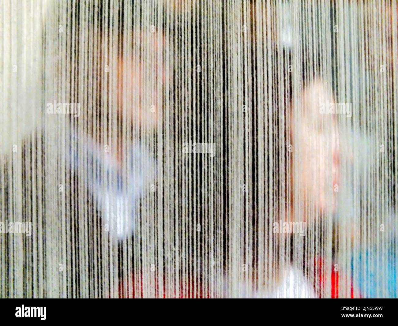 People behind white straight strands texture background, fiber pattern ...