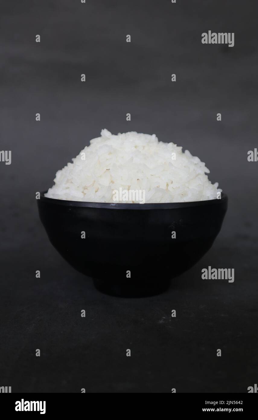 white steamed rice or nasi putih served in little bowl isolated on ...