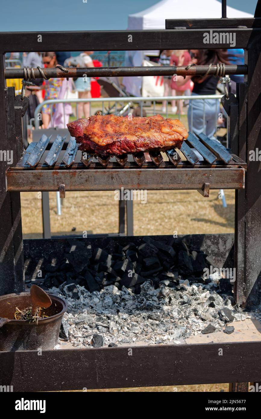 A vertical shot of a bbq during the beach festival in Ireland Stock ...