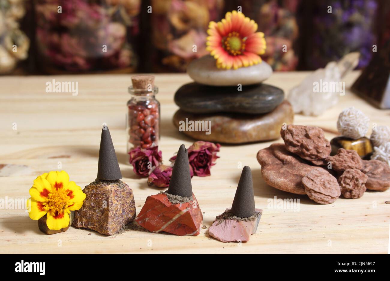 Incense Cones and Desert Rose Rocks on Meditation Table With Pyramid in ...