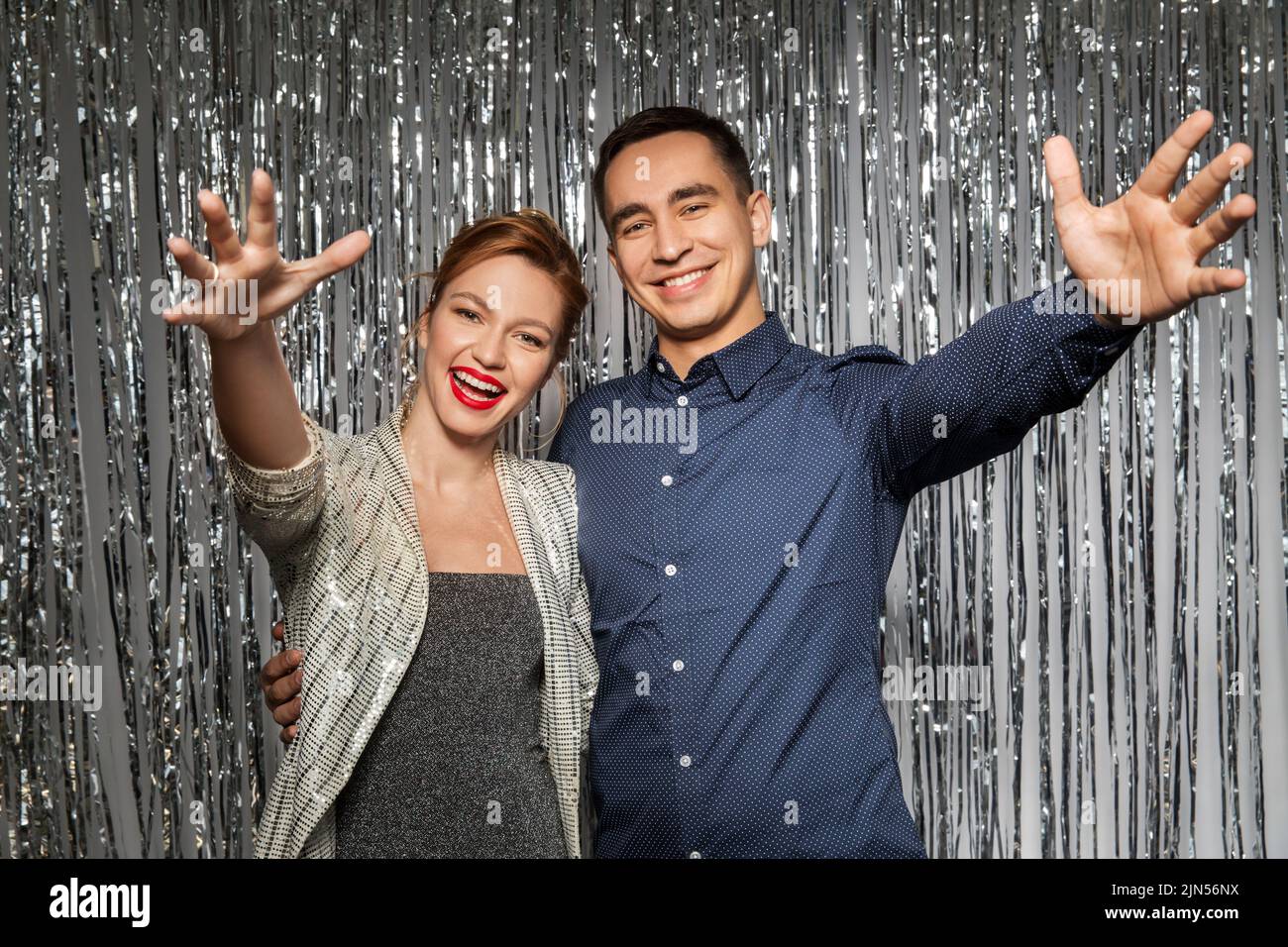 happy hugging couple in party clothes Stock Photo - Alamy