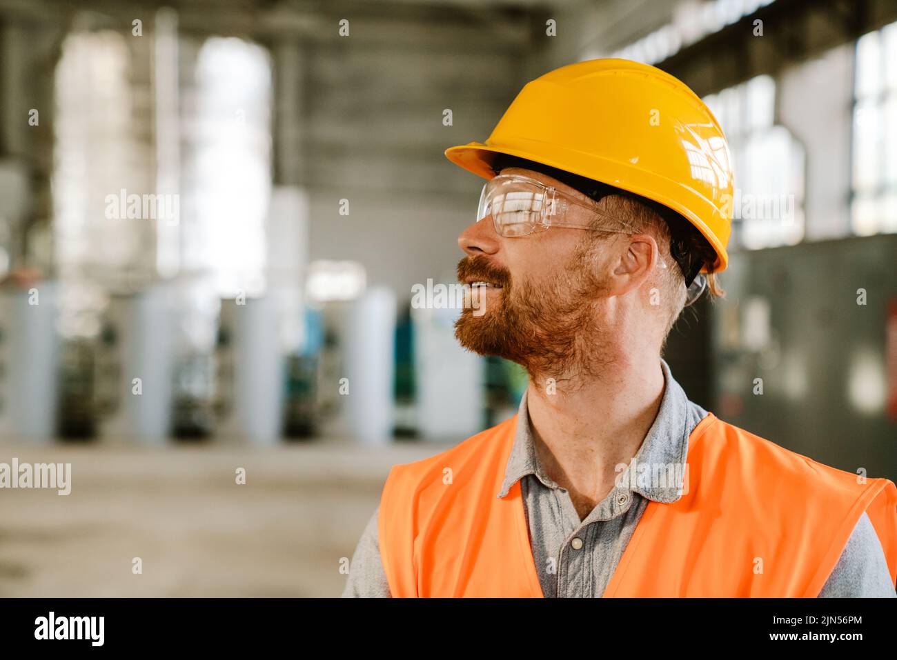 Factory worker man white helmet hi-res stock photography and images - Alamy