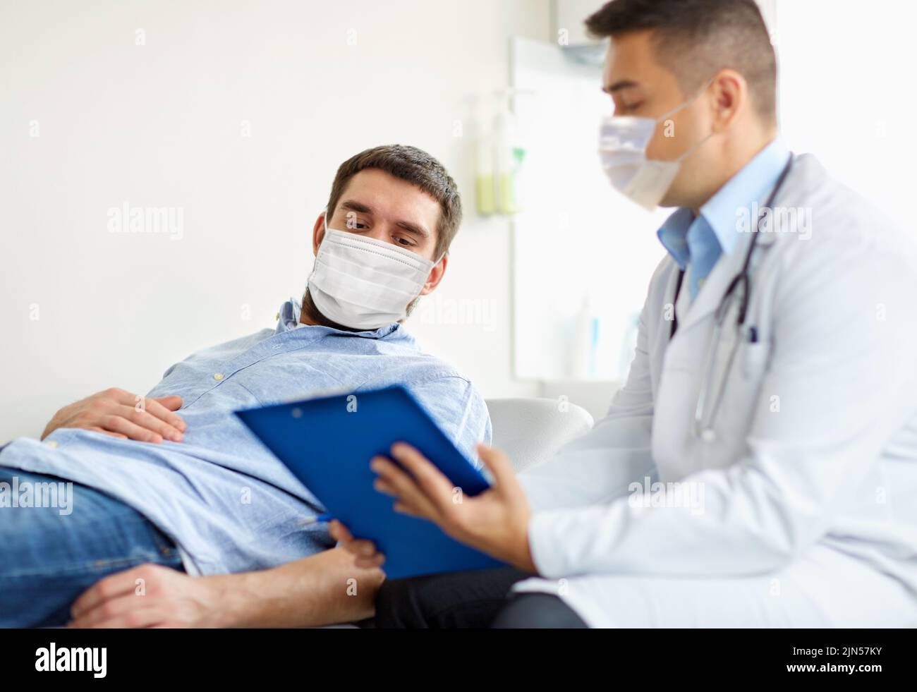Doctor patient in protective masks hi-res stock photography and images ...