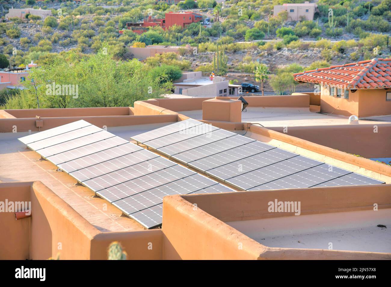 Solar panels on a flat roof of a mediterranean house at Tucson, Arizona ...