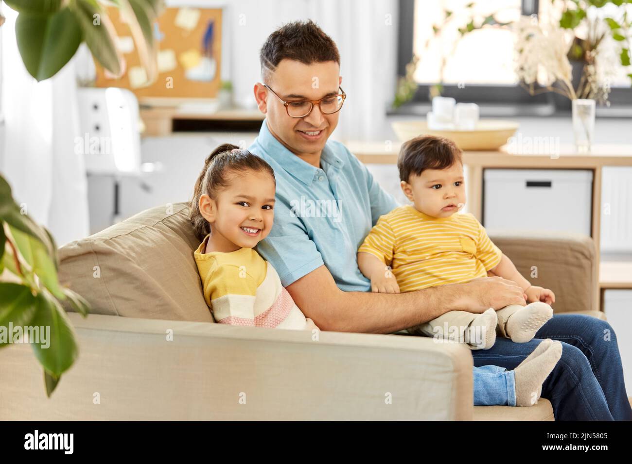 happy father with little children at home Stock Photo - Alamy