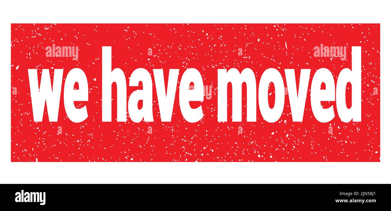 we have moved text written on red grungy stamp sign Stock Photo - Alamy