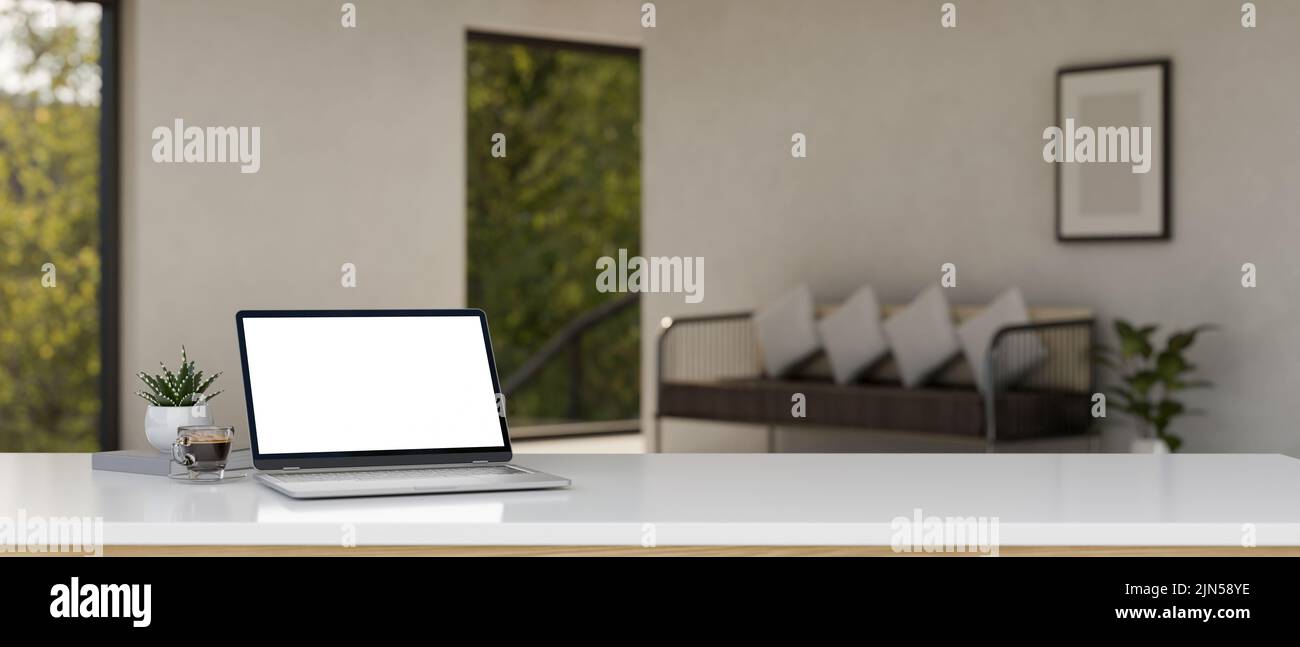 White Tabletop Workspace With Notebook Laptop Computer White Screen